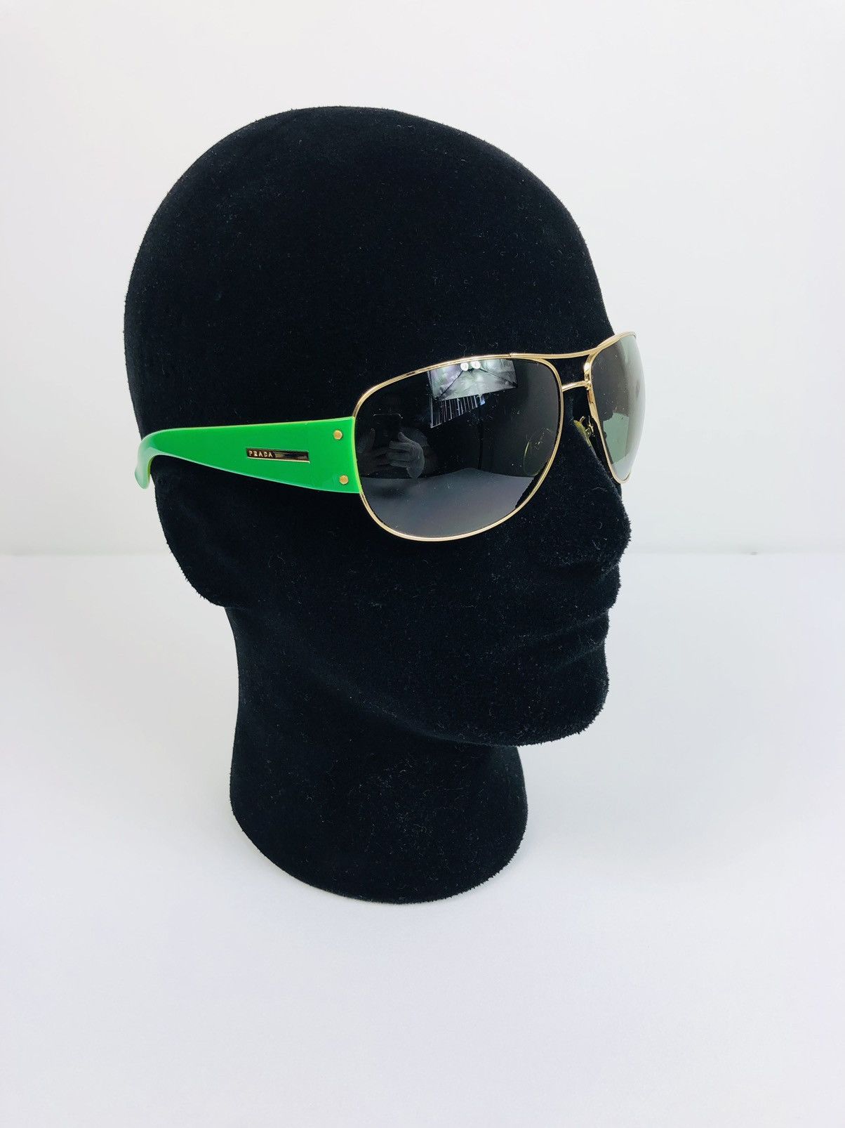 Prada Prada rasta sunglasses | Grailed