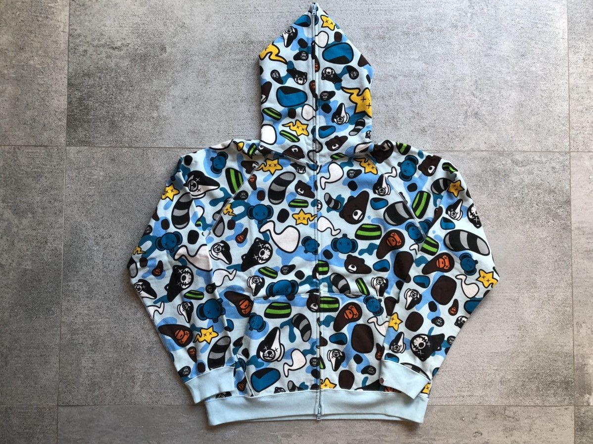 Bape × Kaws A Bathing Ape (BAPE) x Kaws Blue Animal Kingdom Full Zip Up ...