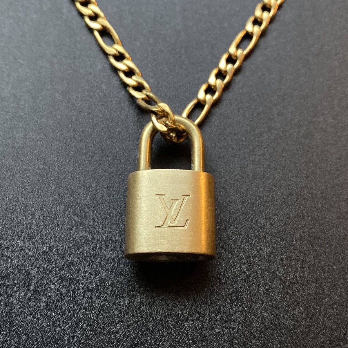 Louis Vuitton Louis Vuitton Lock & Gold Chain | Grailed