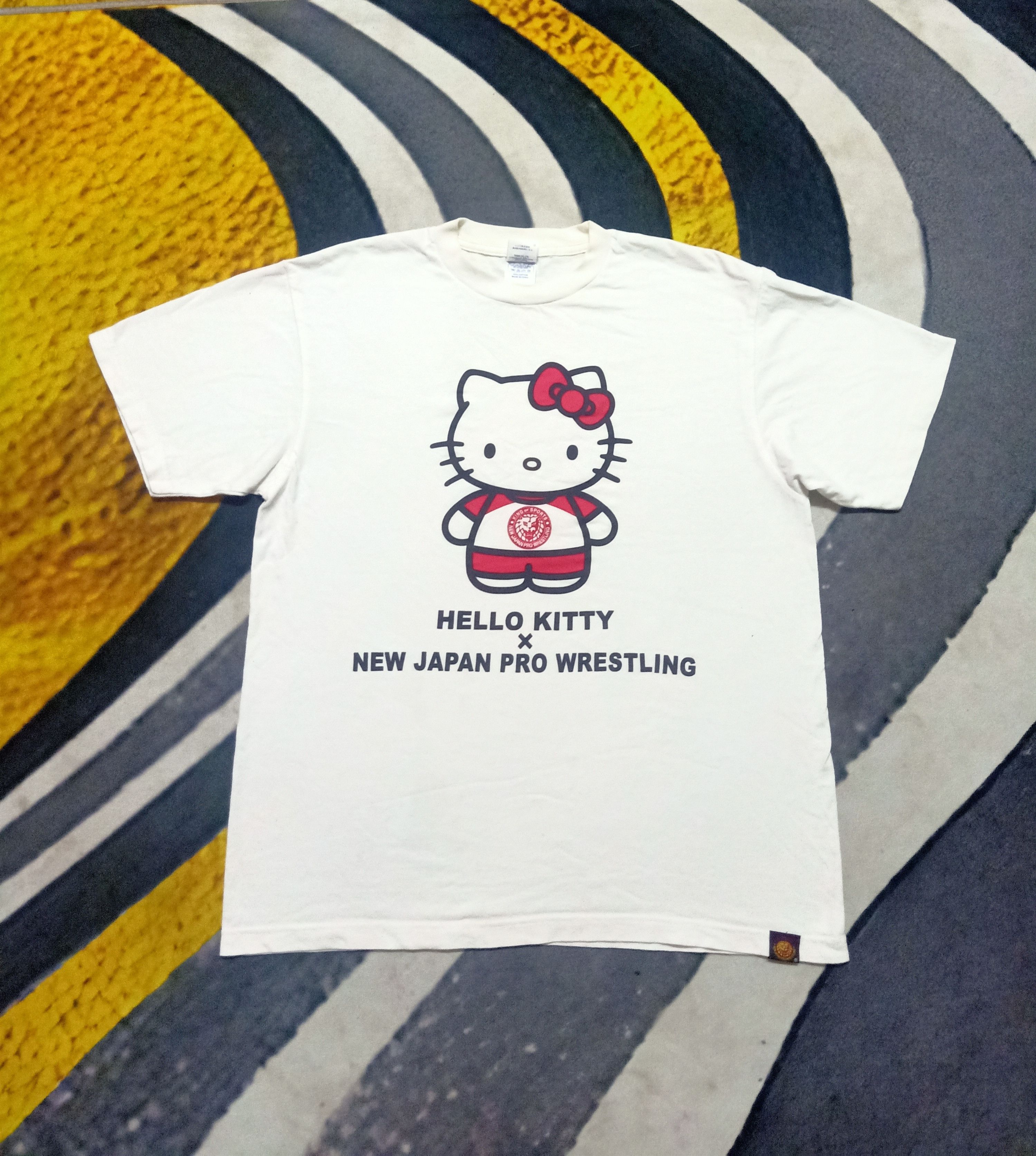 Anime × Rap Tees × WWE Hello kitty X Japan Pro Wrestling | Grailed