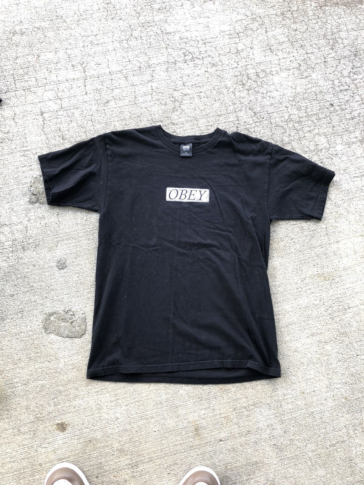 Vintage vintage obey spell out black and white shirt | Grailed