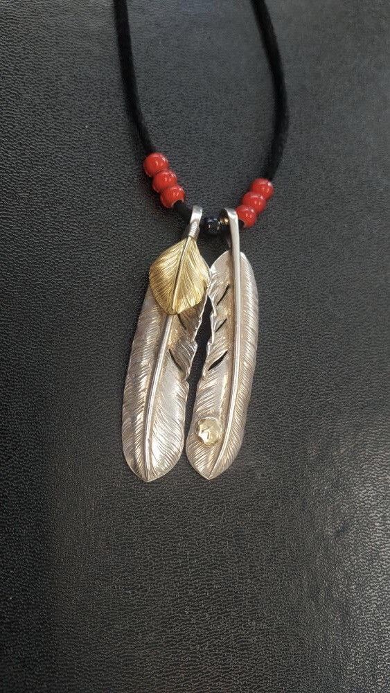 Goros Goros Gold Top Feather | Grailed