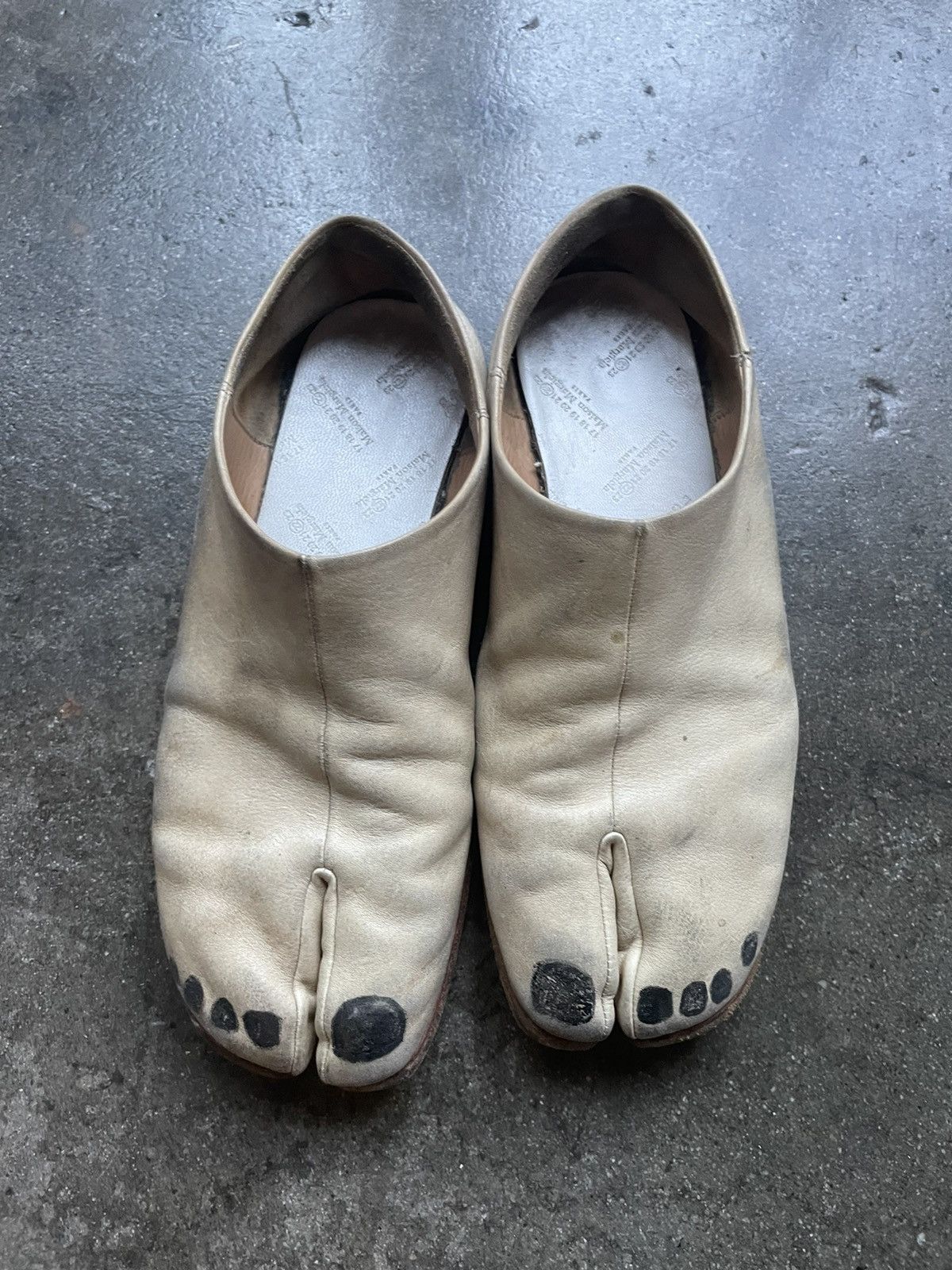 Maison Margiela Tan leather margiela tabis with black toe nails | Grailed