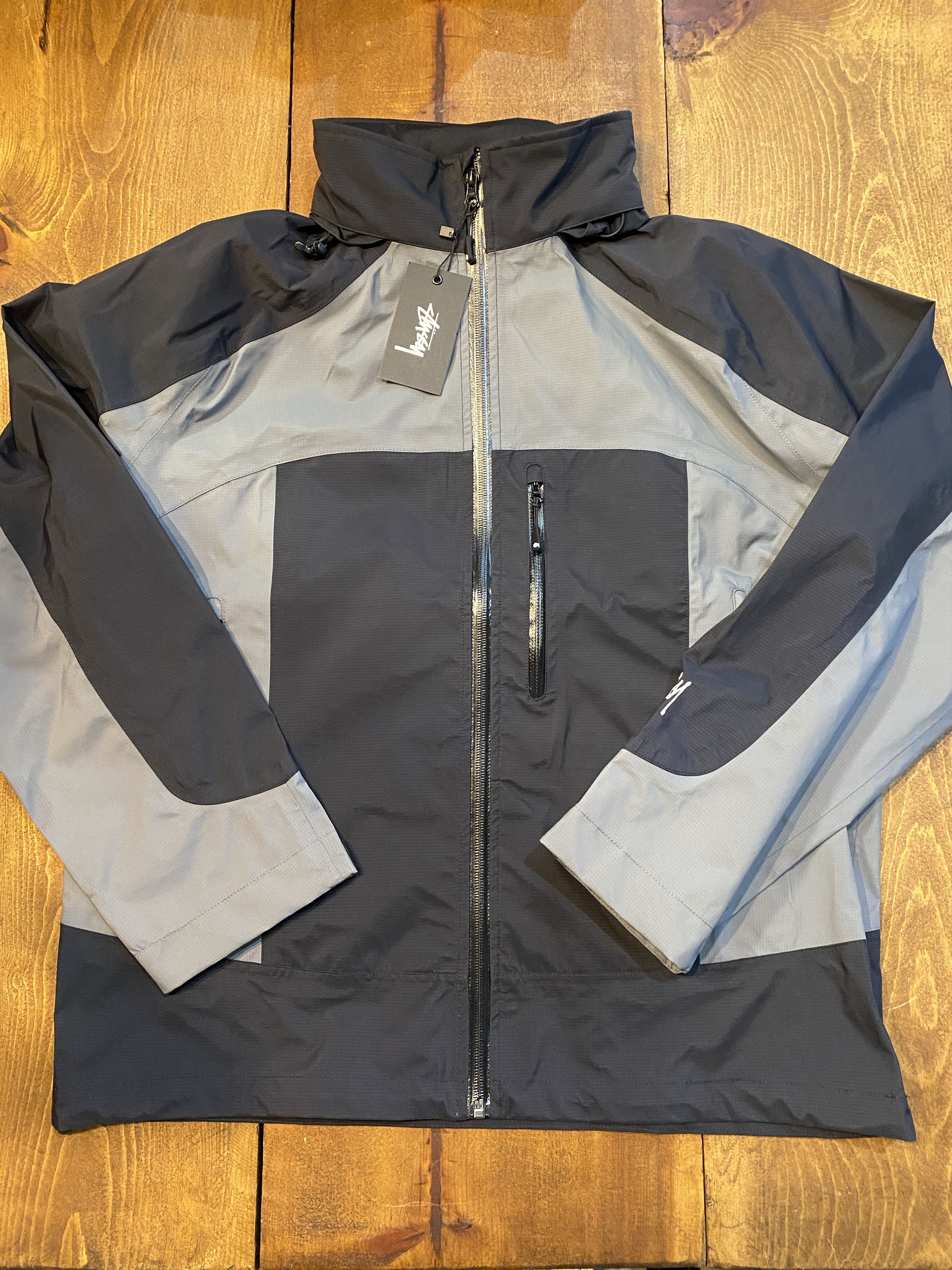 Stussy Stussy taped seam rain shell jacket in Black | Grailed