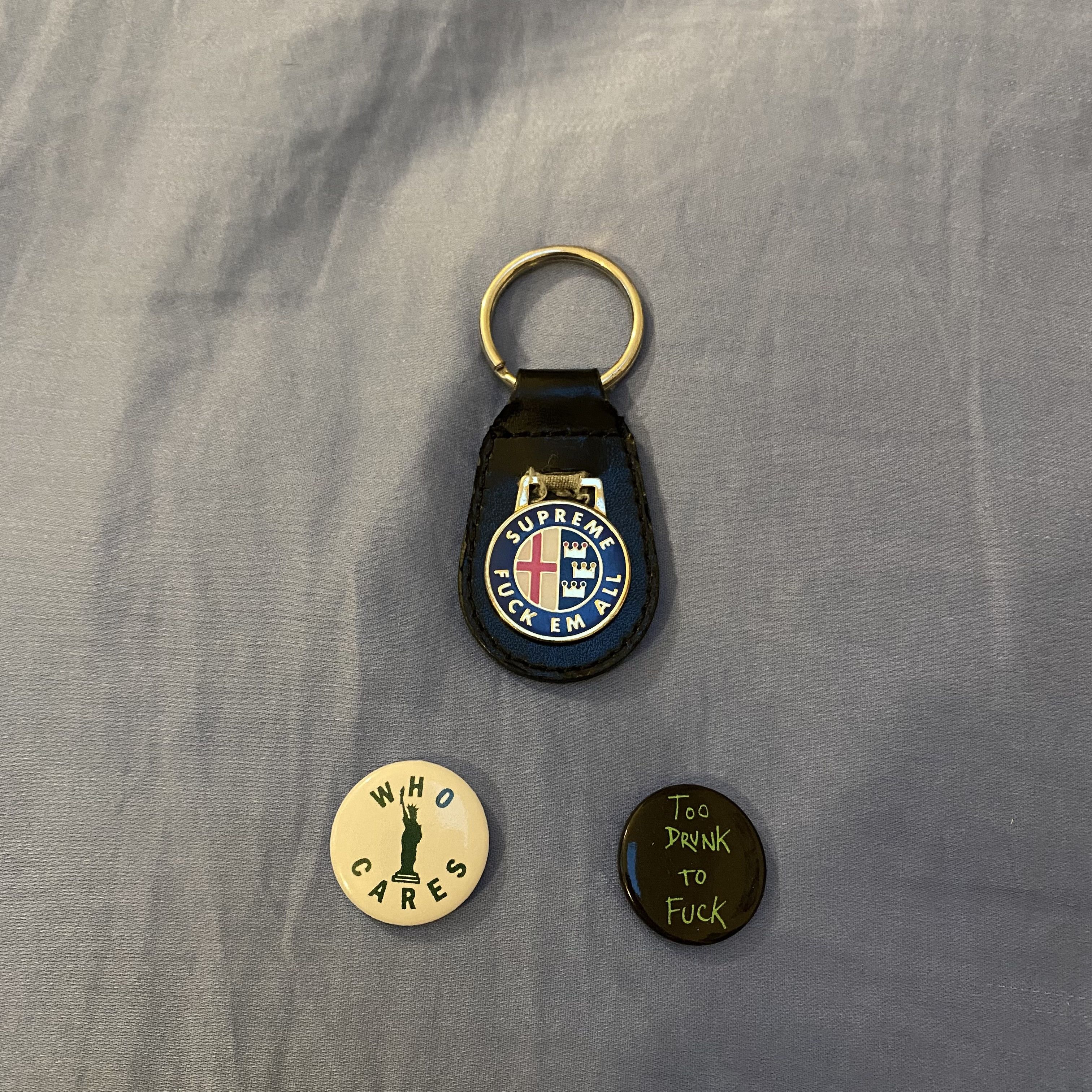 Supreme SUPREME ENAMEL KEYCHAIN AND BUTTON PINS | Grailed