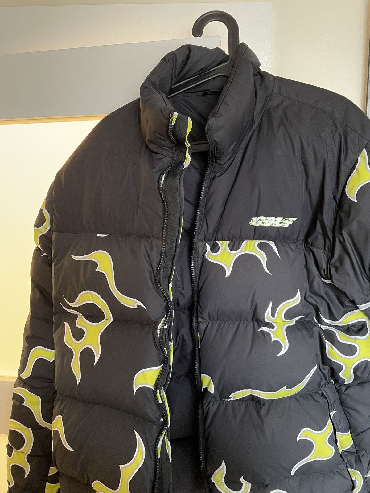 Golf Wang Golf Wang Flame Puffer Jacket - Black and Yellow | Grailed