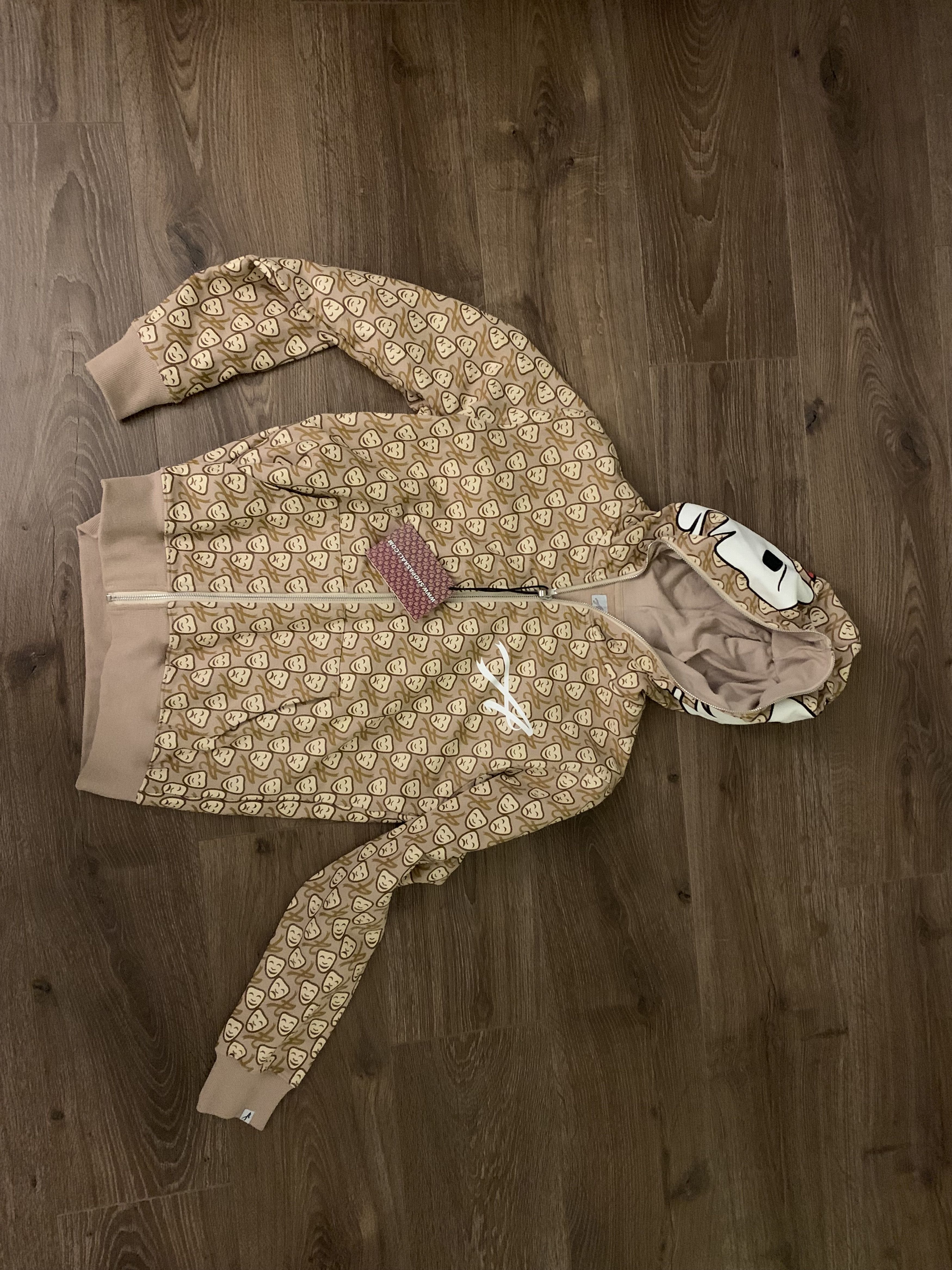 Streetwear Asaali 1st Beige All Over Print White Leather Mask Hoodie ...