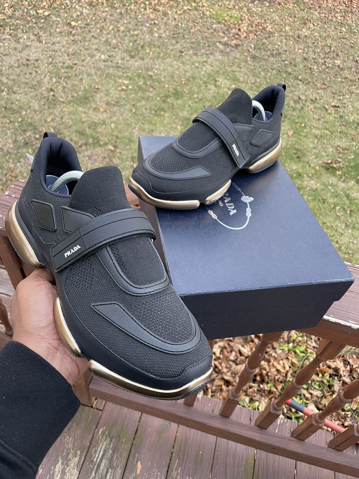 Prada Black and gold Prada cloudbust | Grailed