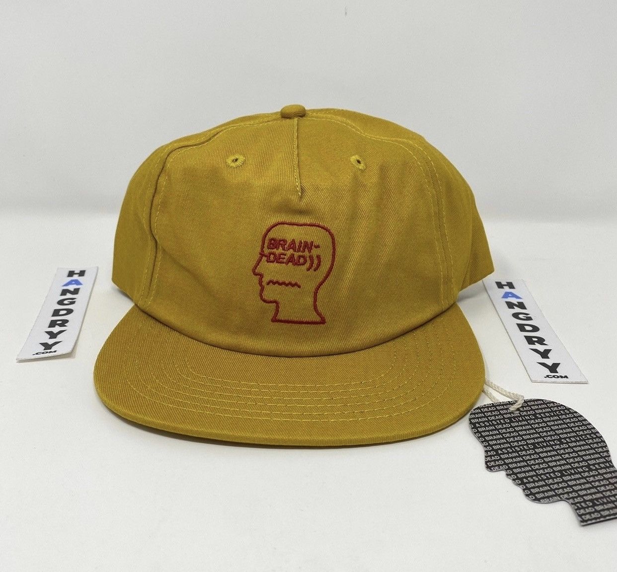 Brain Dead 5 PANEL TWILL LOGO HEAD HAT - YELLOW | Grailed