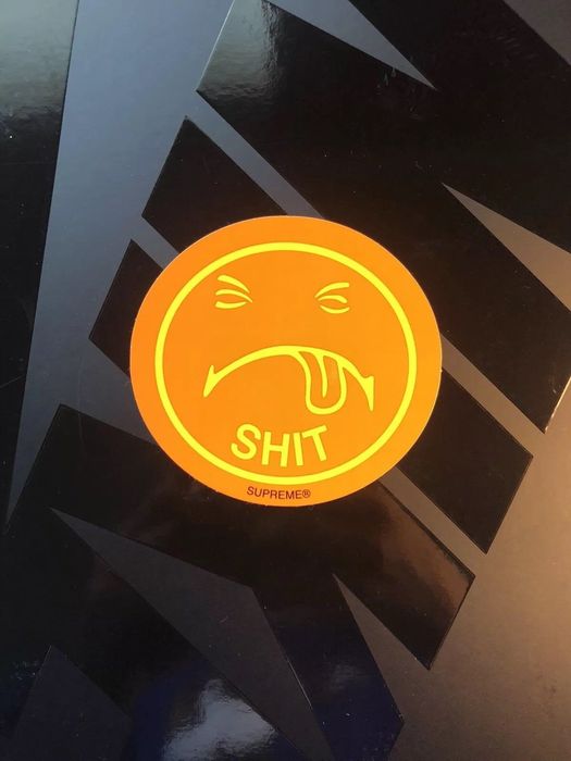 Supreme shit orange tongue smiley face sticker | Grailed