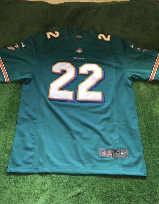 Nike Early 2000s Reggie Bush Nike Miami Dolphins Jersey w Hoodies | Grailed