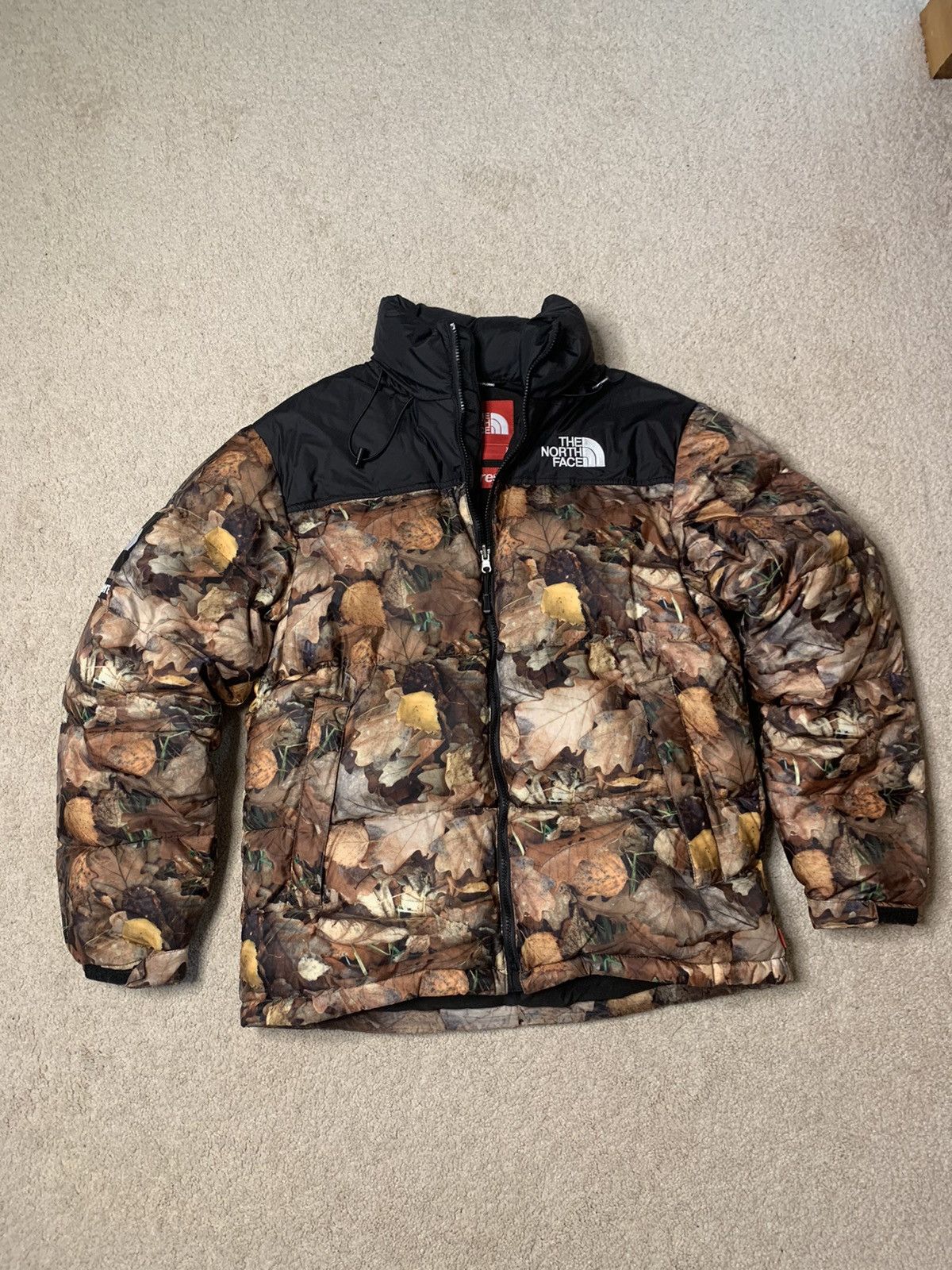 Supreme × The North Face Supreme The North Face Nuptse Jacket leaves ...