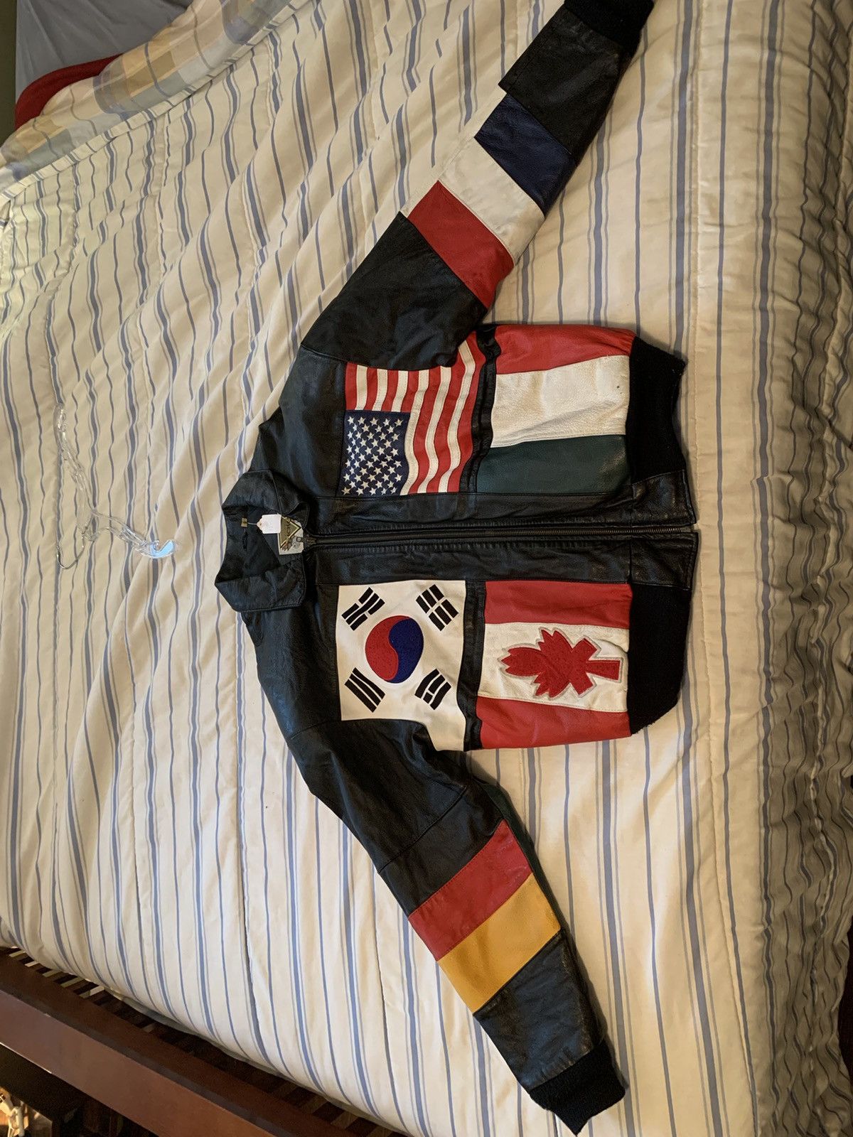 Vintage Vintage leather jacket with countries flags on it | Grailed