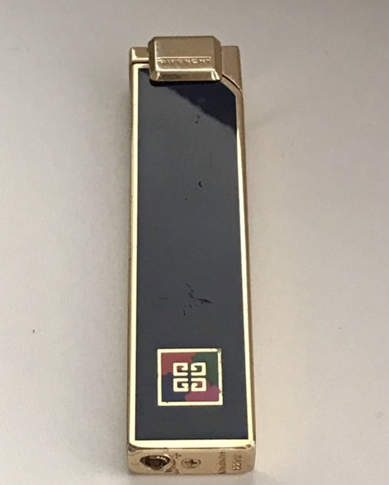 Givenchy RARE vintage givenchy lighter | Grailed