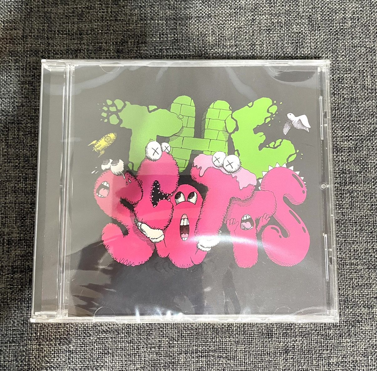 Kaws × Kid Cudi × Travis Scott Travis Scott x Kid Cudi x Kaws “The ...