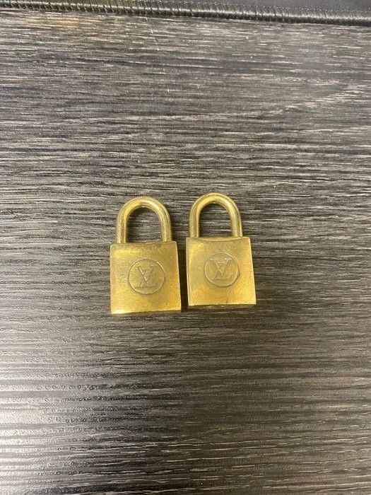 Louis Vuitton Louis Vuitton Gold Lock | Grailed