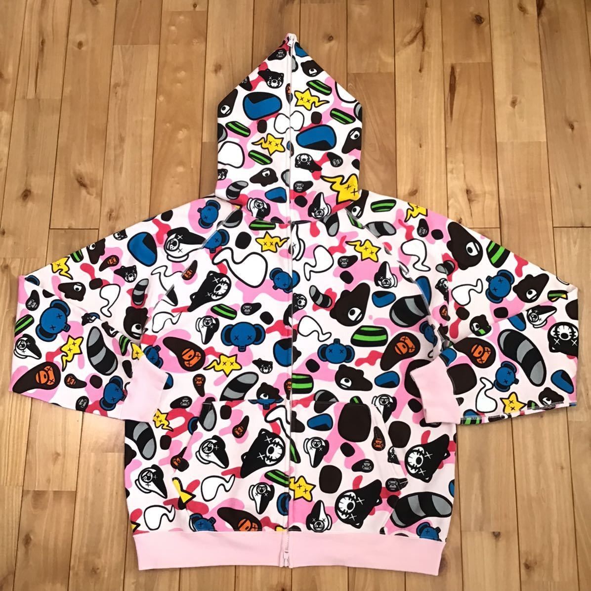Bape × Kaws BAPE × KAWS milo animal kingdom full zip hoodie pink | Grailed