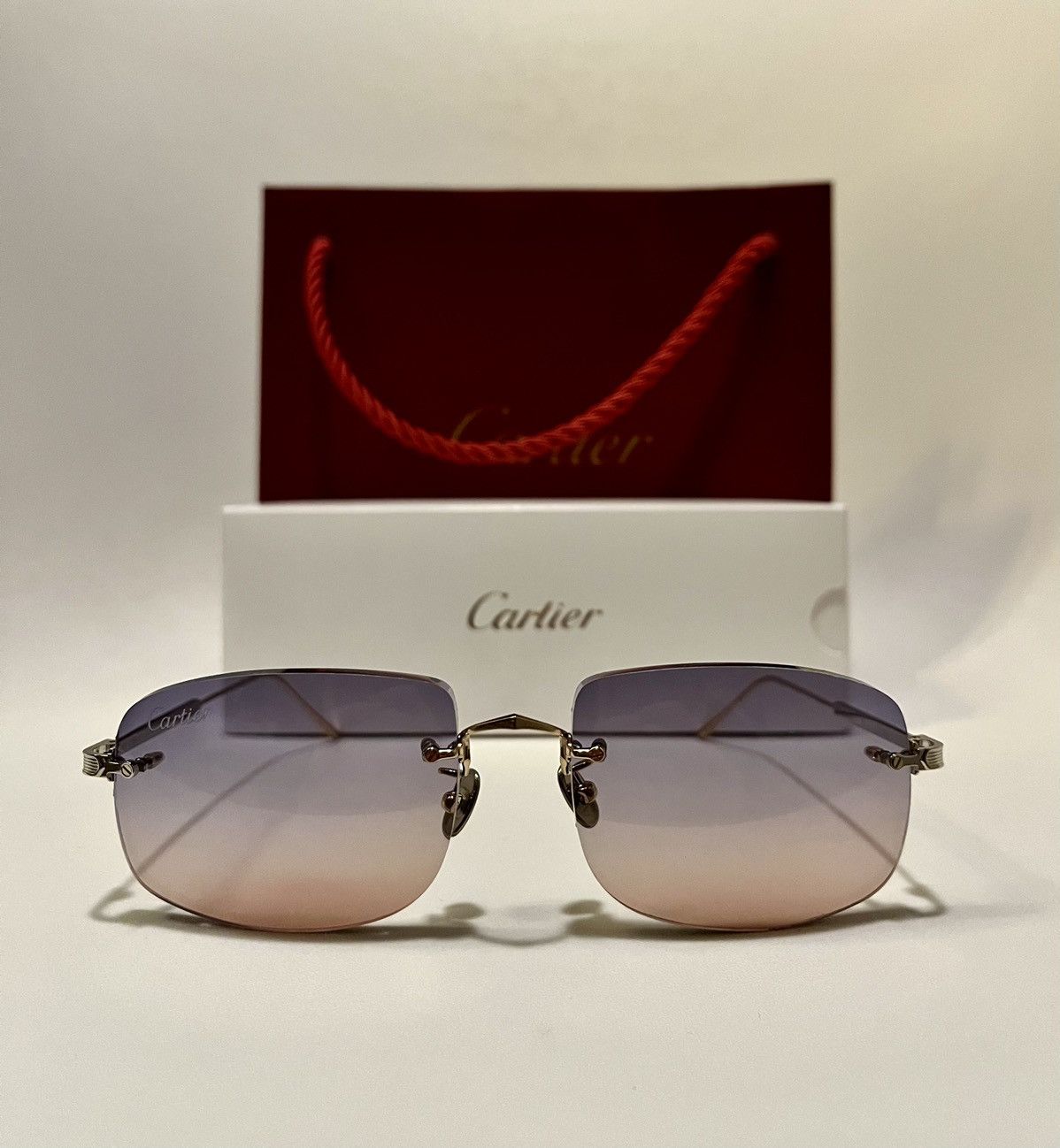Cartier Cartier rimless sunglasses titanium biColor CT0228O | Grailed