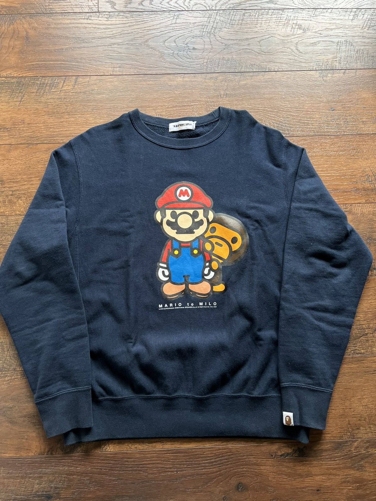 Bape × Nintendo 2008 Bape baby milo Mario crewneck navy | Grailed