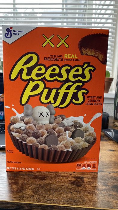 Kaws KAWS X REESE’S PUFF CEREAL COLLECTABLE LIMITED EDITION | Grailed