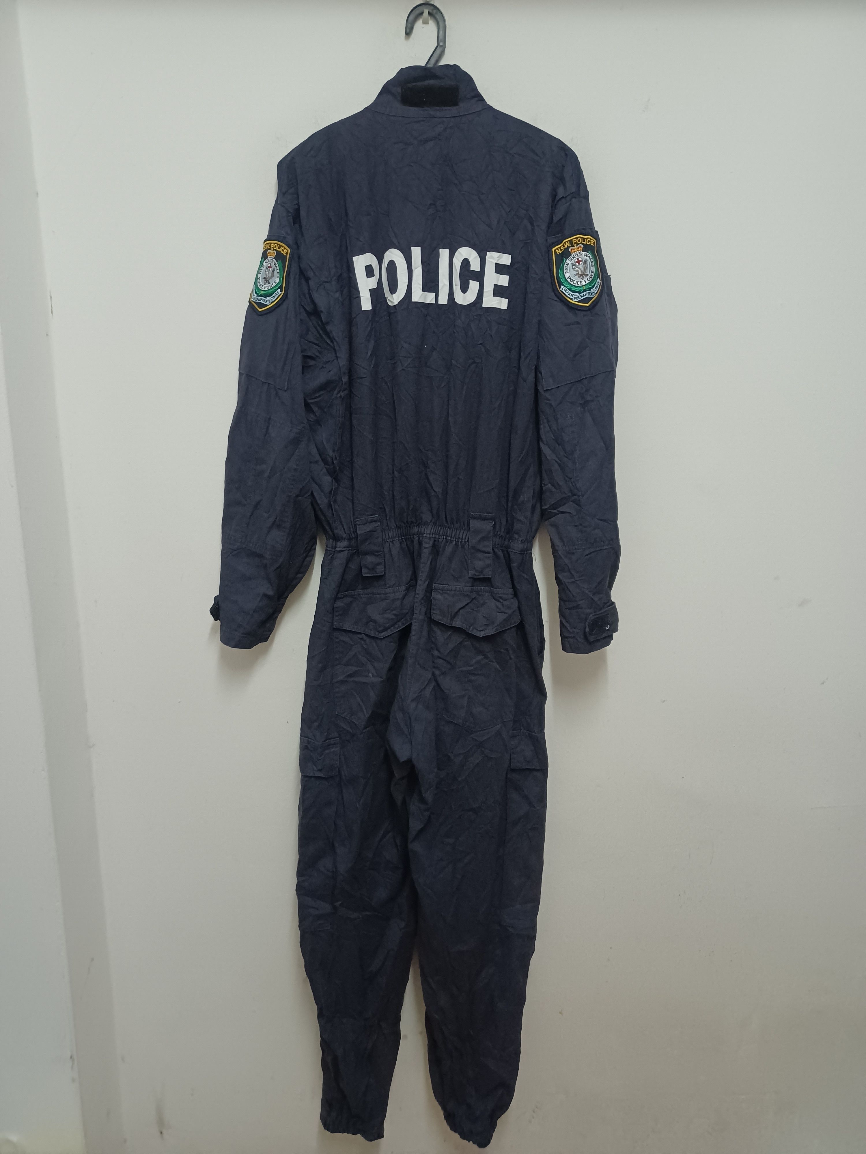 Police × Racing × Sports Specialties MOTOMAN X POLICE JUMPSUITS | Grailed