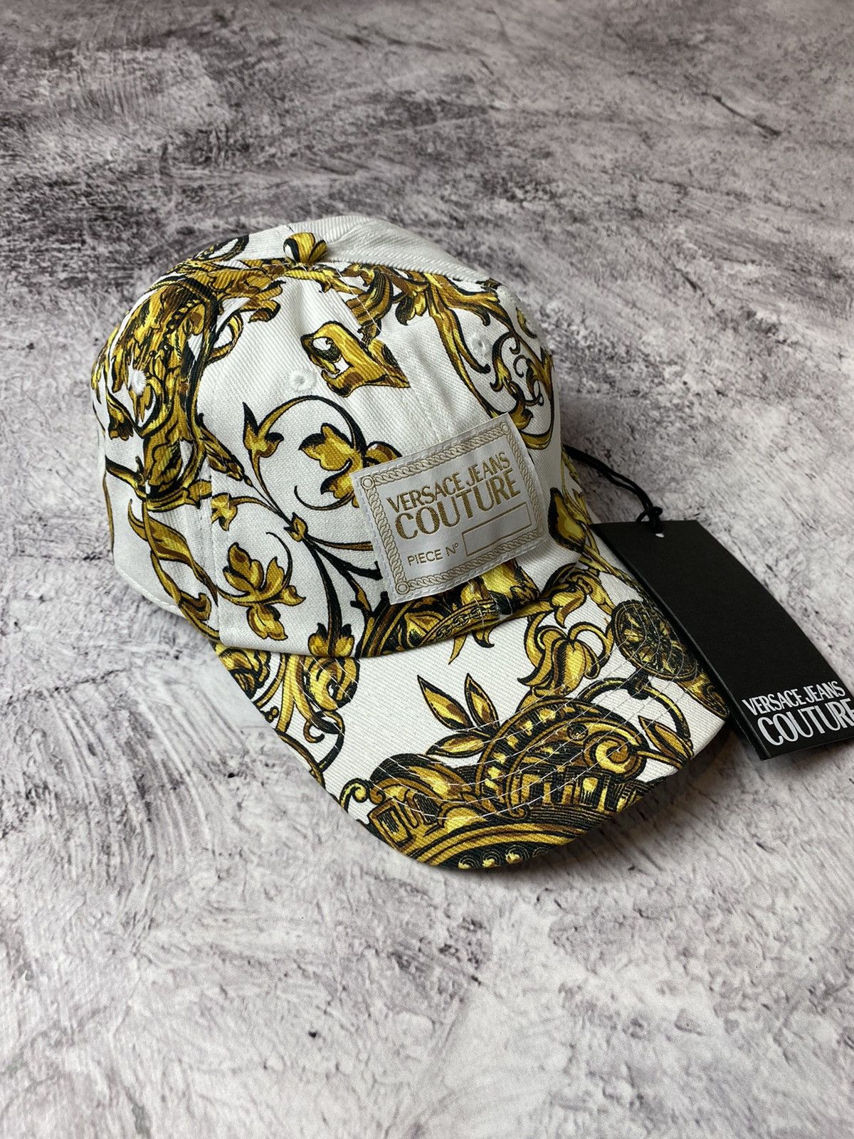 Versace × Versace Jeans Couture Versace Jeans Coutre white drip cap ...