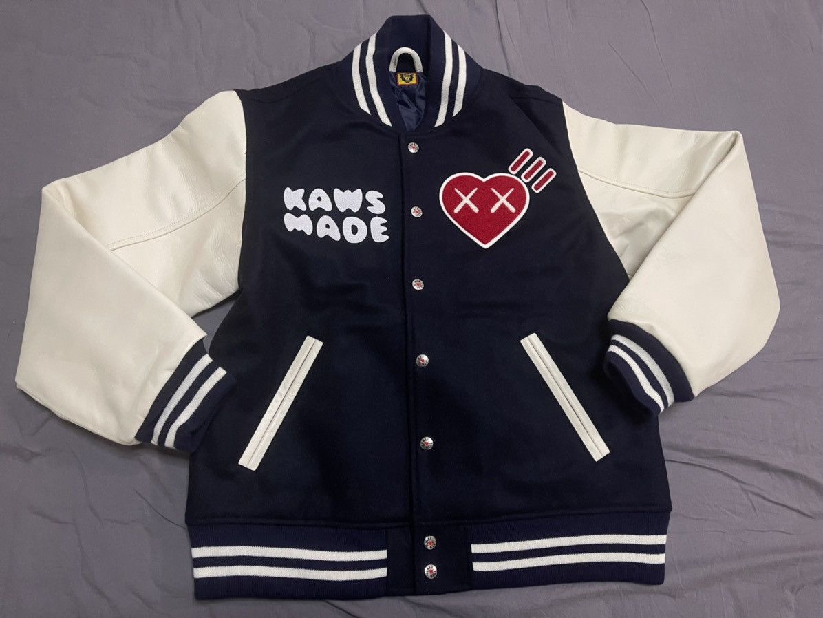 Human Made × Kaws Human made kaws varsity Jacket navy | Grailed