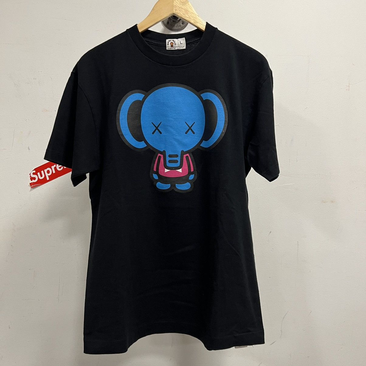 Bape Bape X Kaws Elephant Baby Milo Tee | Grailed