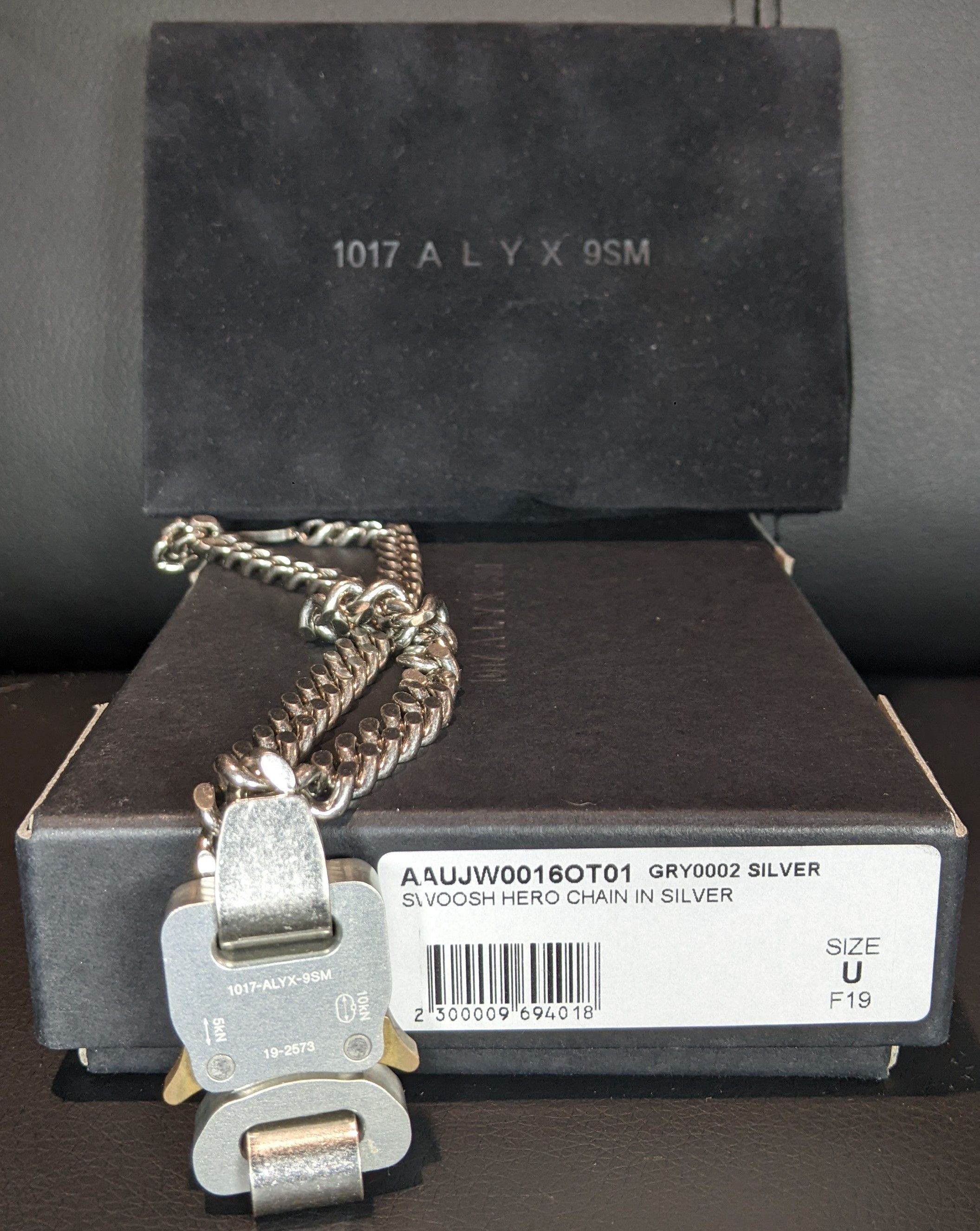 1017 ALYX 9SM Alyx Swoosh Hero Chain Necklace In Silver | Grailed