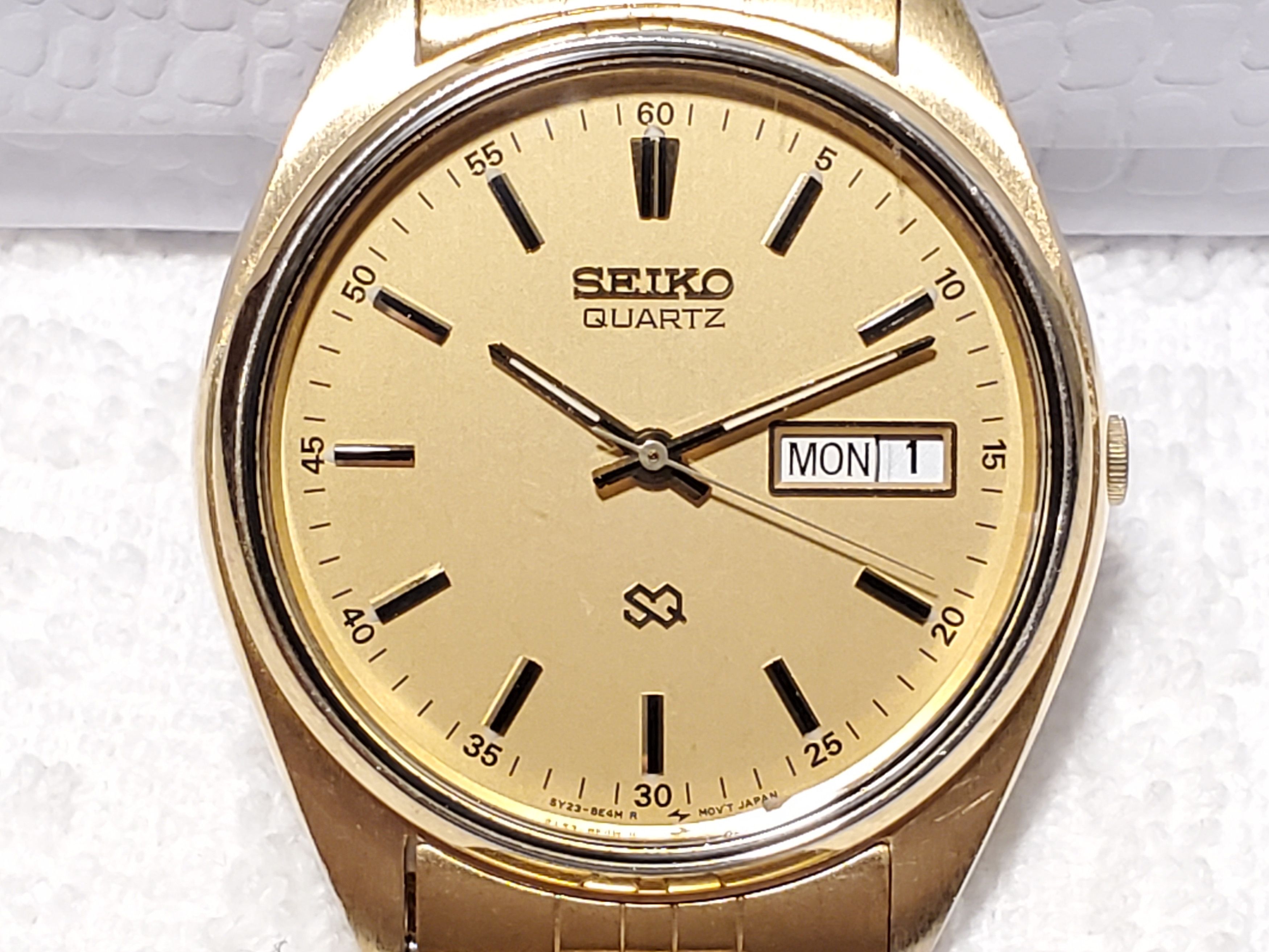 Seiko Vintage Seiko SQ Gold Tone Day Date Quartz Watch | Grailed