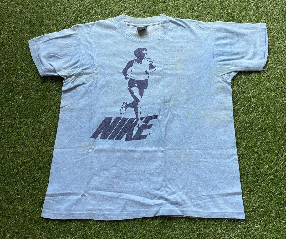 Nike VINTAGE NIKE RUNNING MAN TEE | Grailed