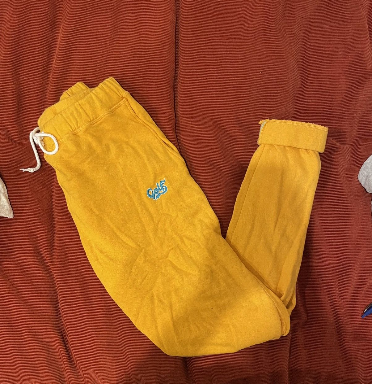 Golf Wang Yellow cursive font tracksuit pants | Grailed