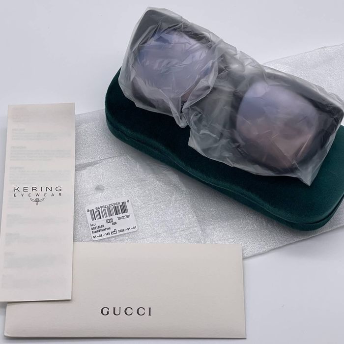Gucci GUCCI GG0163SN 009 Black/Pink Photochromic Transition Women | Grailed