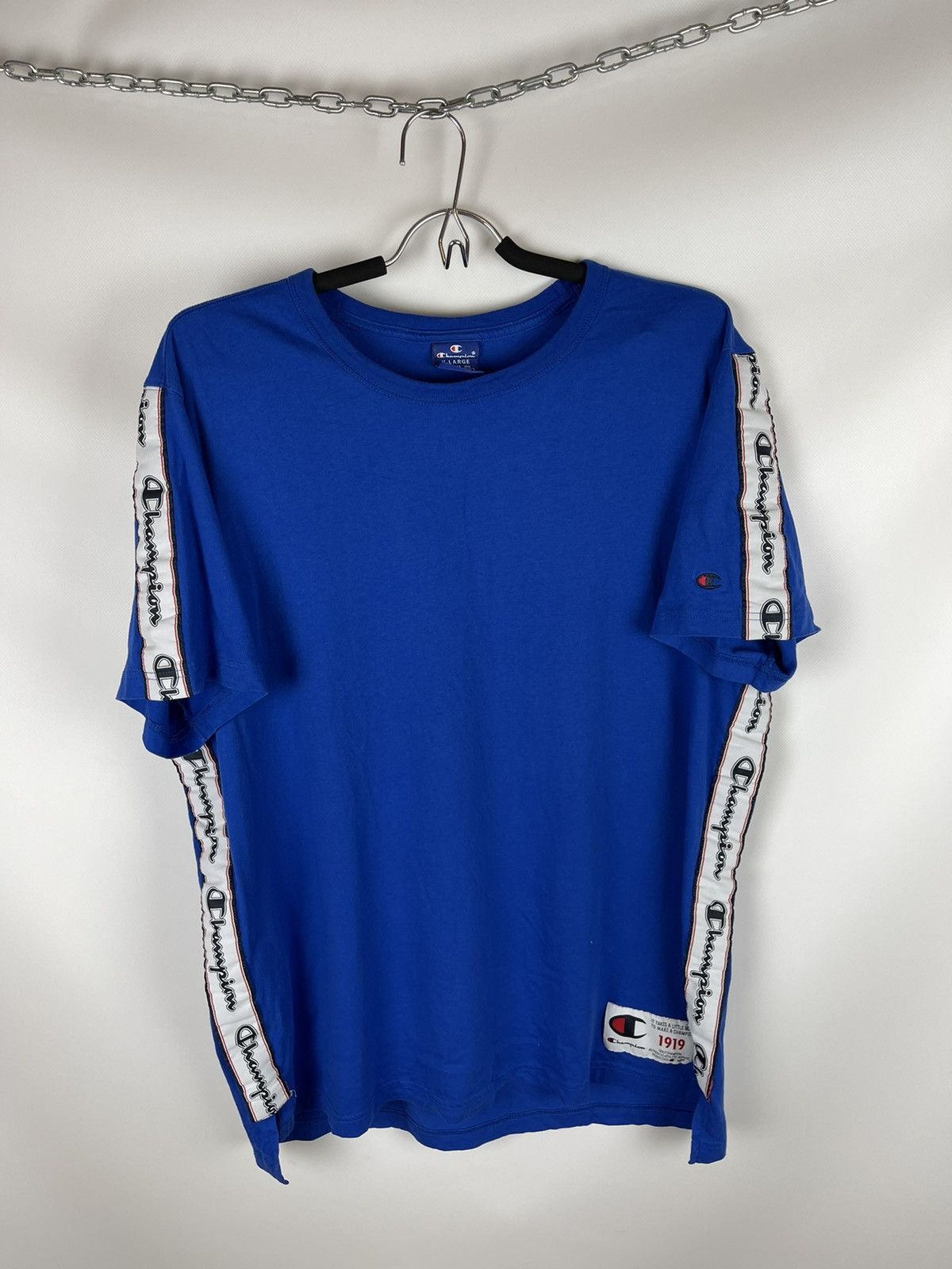 Vintage Champion blue logo tee shirt with sleeves and body stripes ...