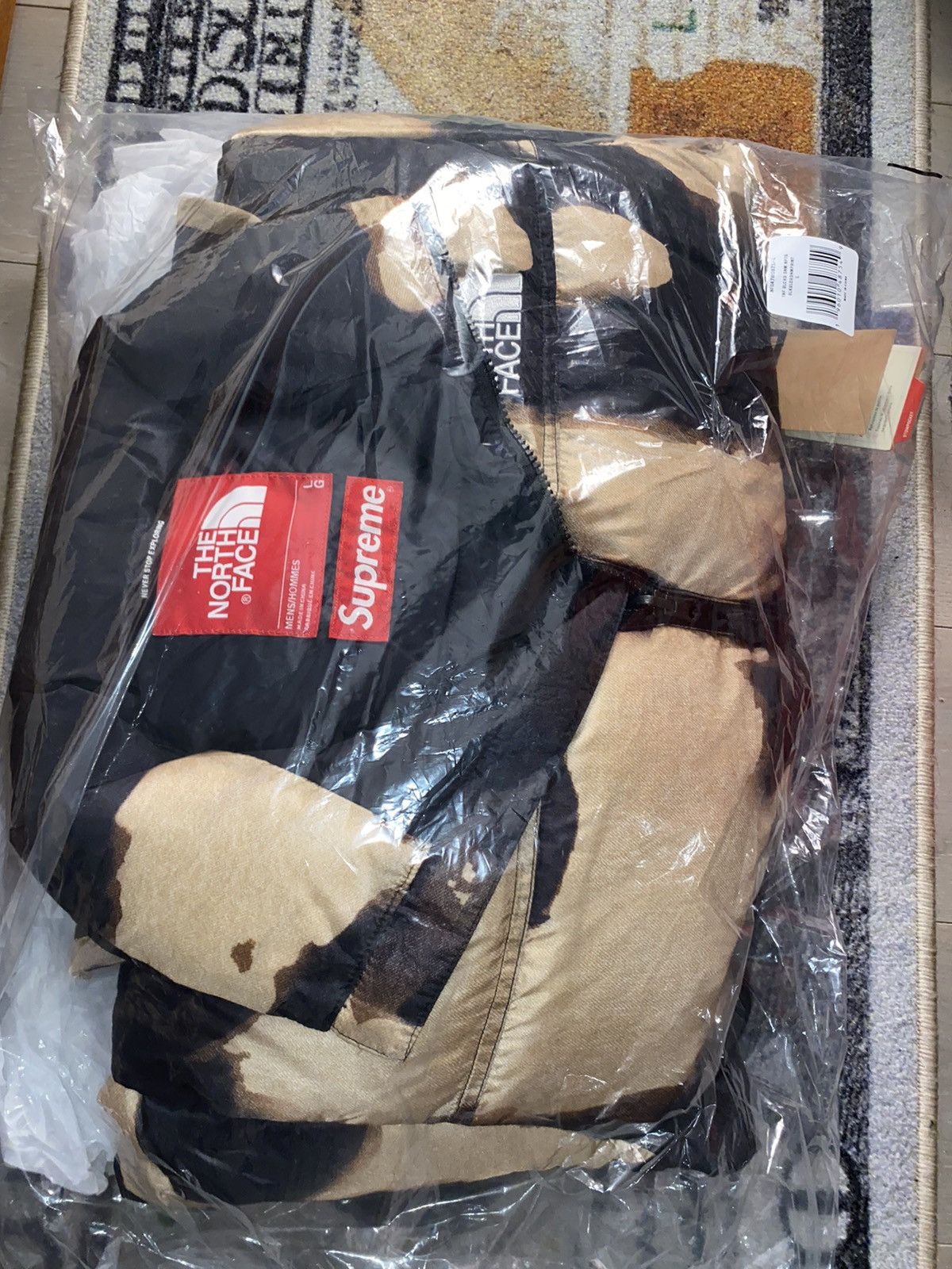 Supreme × The North Face Supreme TNF Bleached Denim Print Nuptse Jacket ...