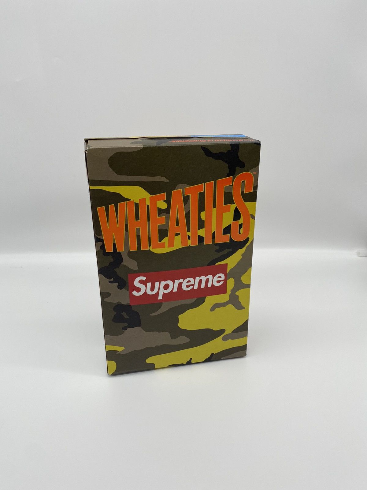 Supreme **WEEKLY STEAL** WHEATIES CEREAL BOX LOGO (YELLOW CAMO) | Grailed