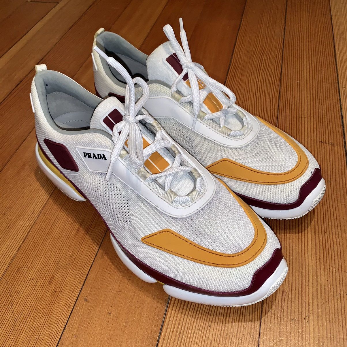 Prada Prada Cloudbust White/Burgundy Sneaker | Grailed