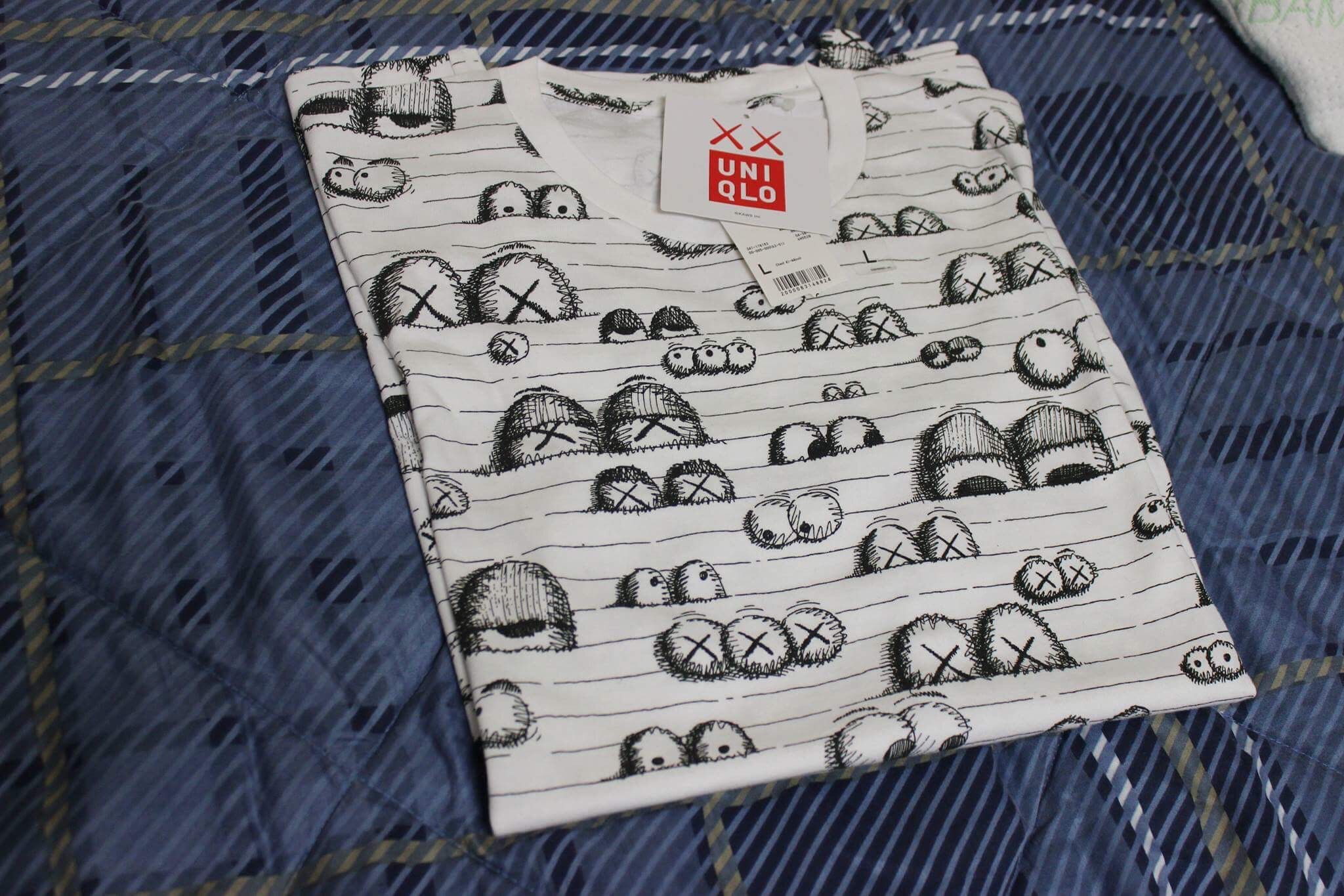Kaws Kaws X Uniqlo Notebook T | Grailed