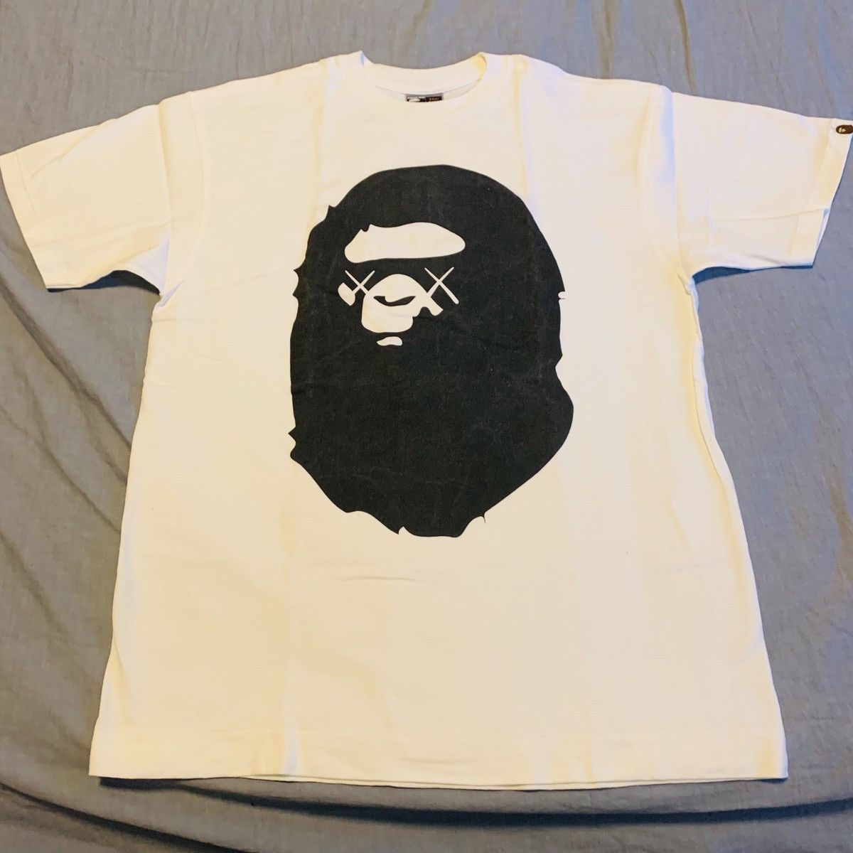 Bape × Kaws Bape x Kaws Face Logo Tee White Large | Grailed