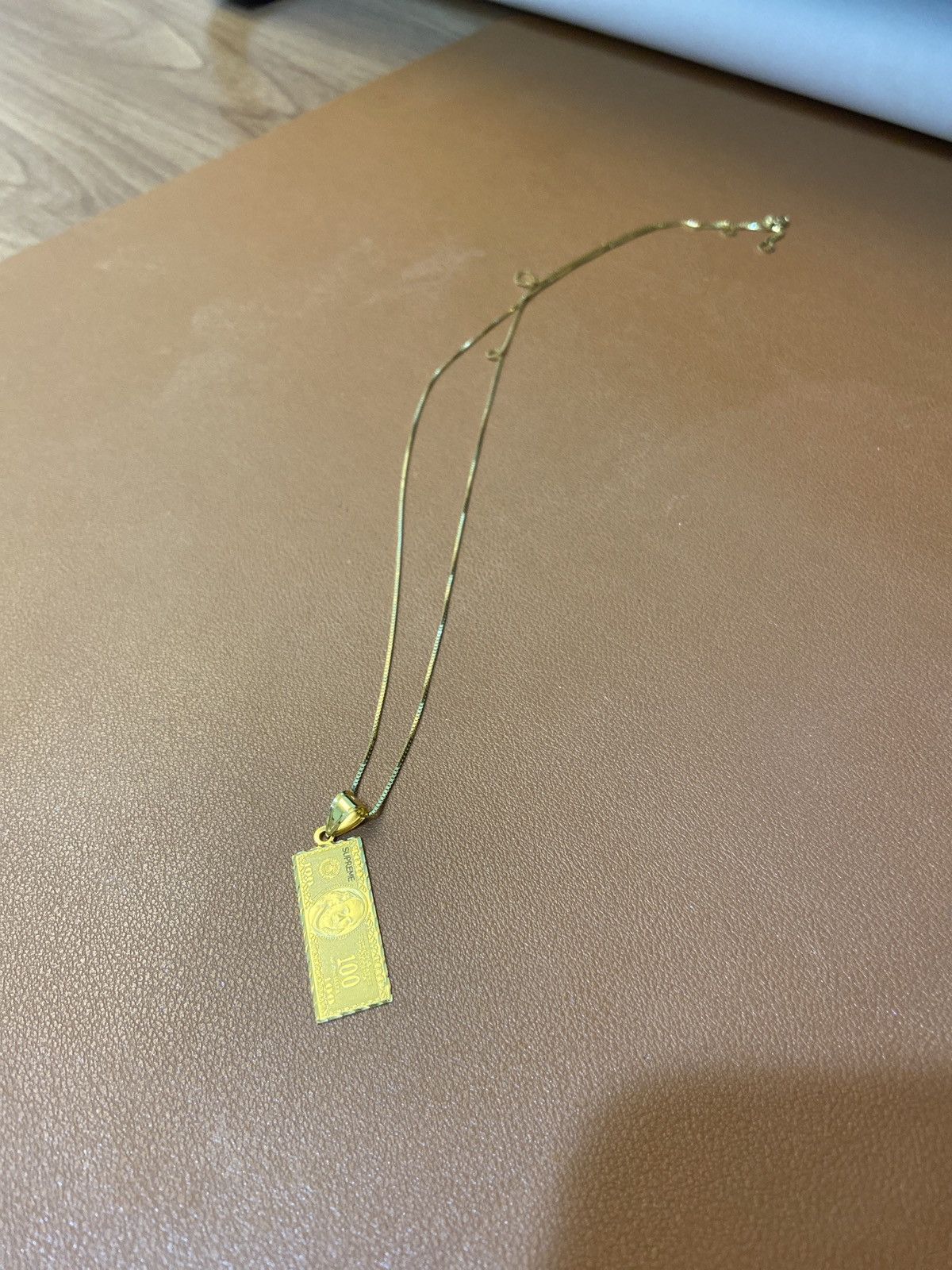Supreme Supreme 100 dollar bill gold pendant necklace 14K | Grailed