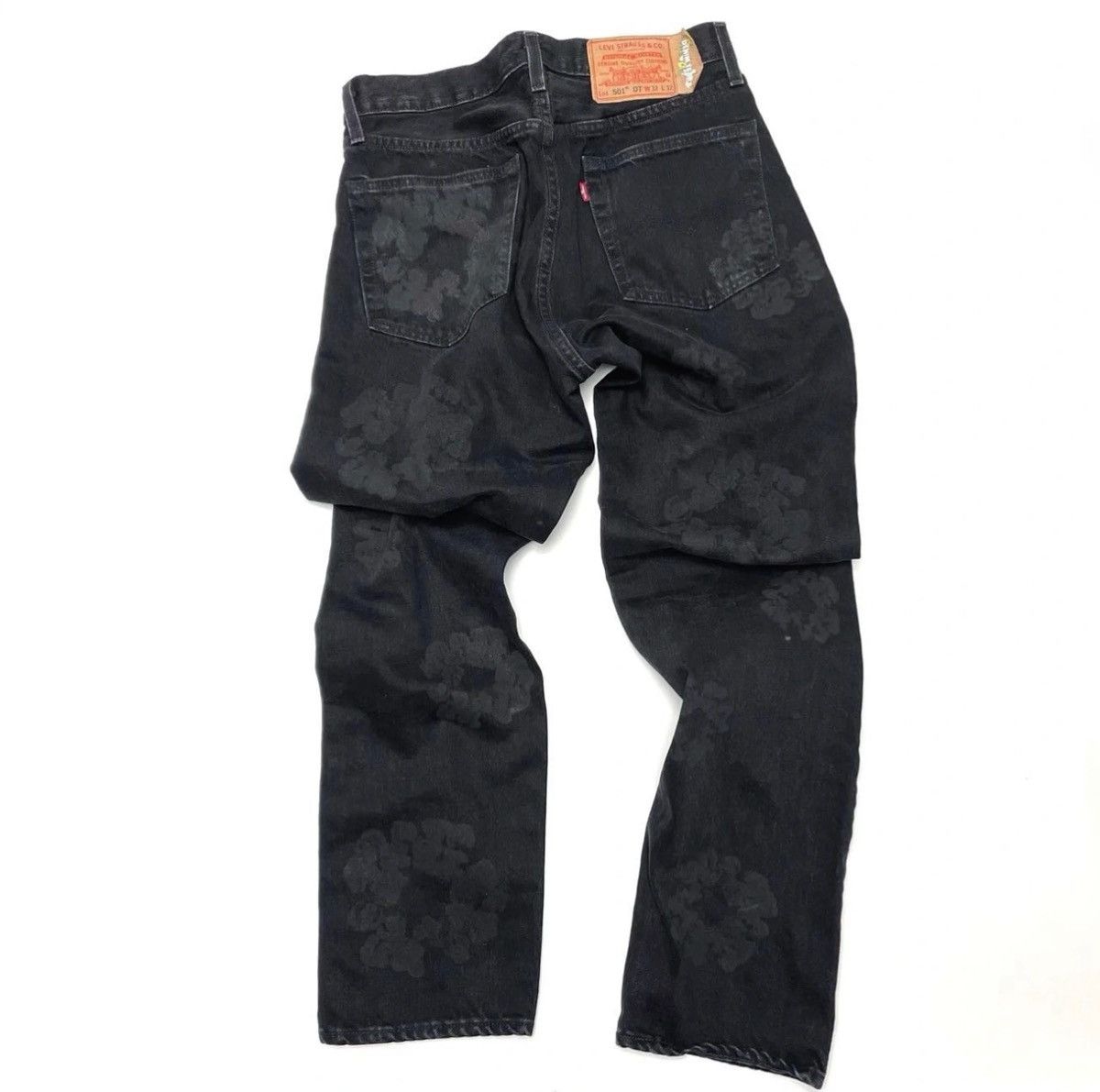 DENIM TEARS Denim Tears Black ‘mono’ cotton wreath jeans | Grailed