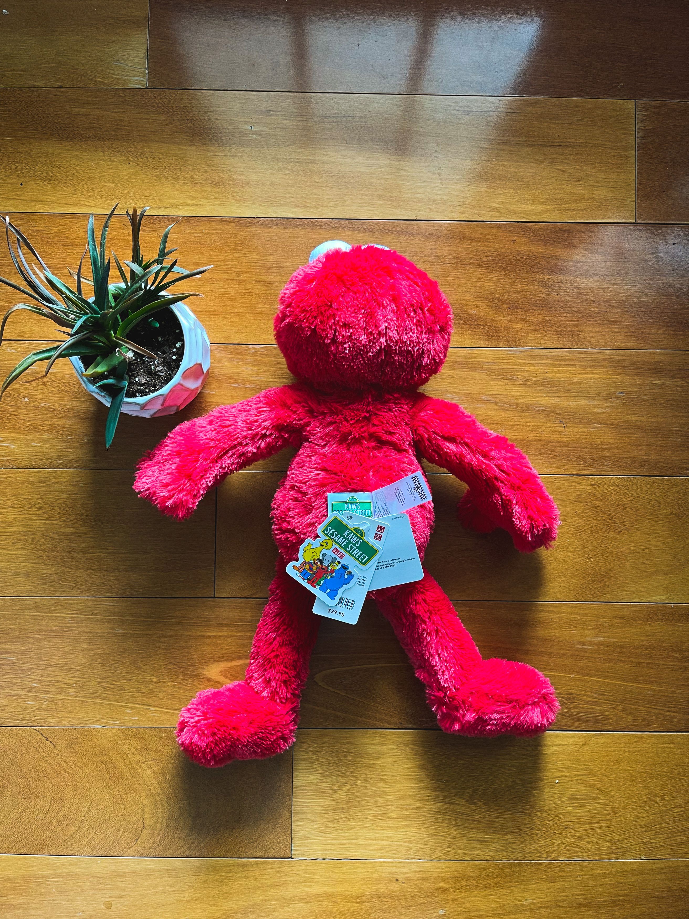 Uniqlo KAWS x UNIQLO Sesame Street Elmo Plush | Grailed