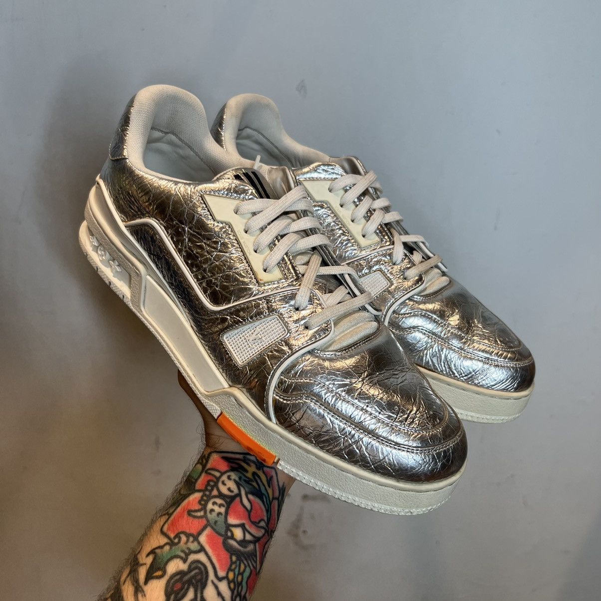 Louis Vuitton Louis Vuitton Metallic Silver Low Top Trainer | Grailed