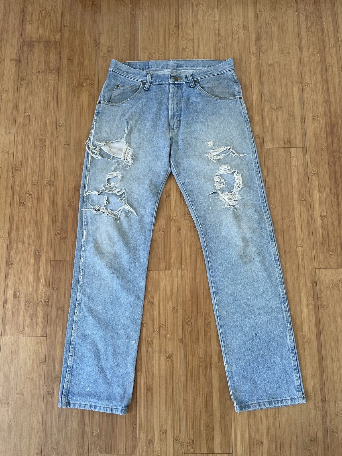 Vintage × Wrangler vintage distressed wrangler jeans | Grailed