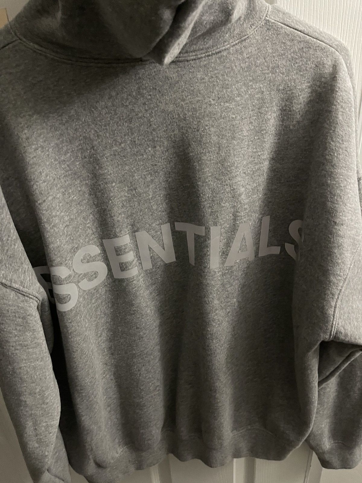 Fear of God Essentials x Fear of God reflective hoodie | Grailed