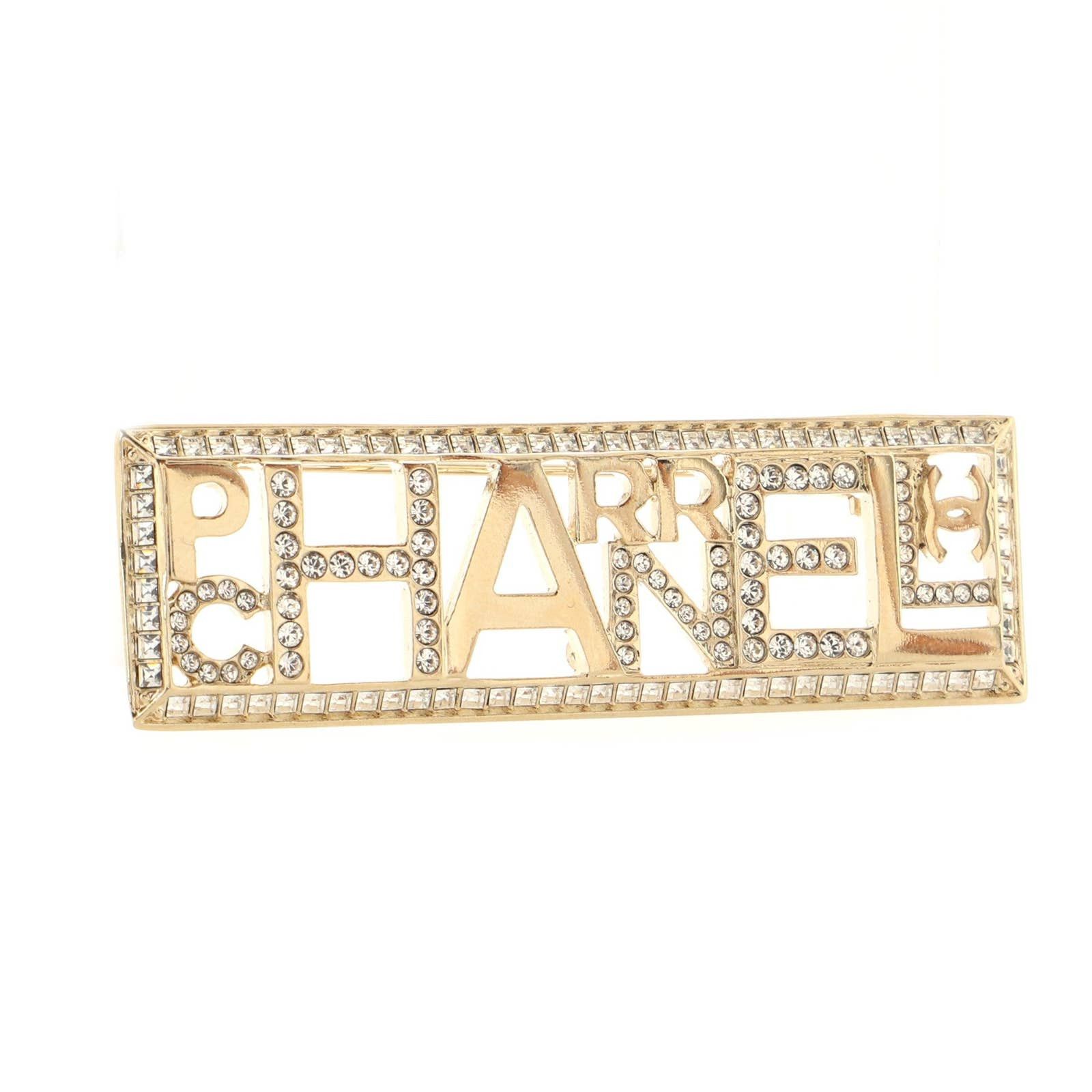 Chanel Pharrell Logo Brooch Metal with Crystals | Grailed