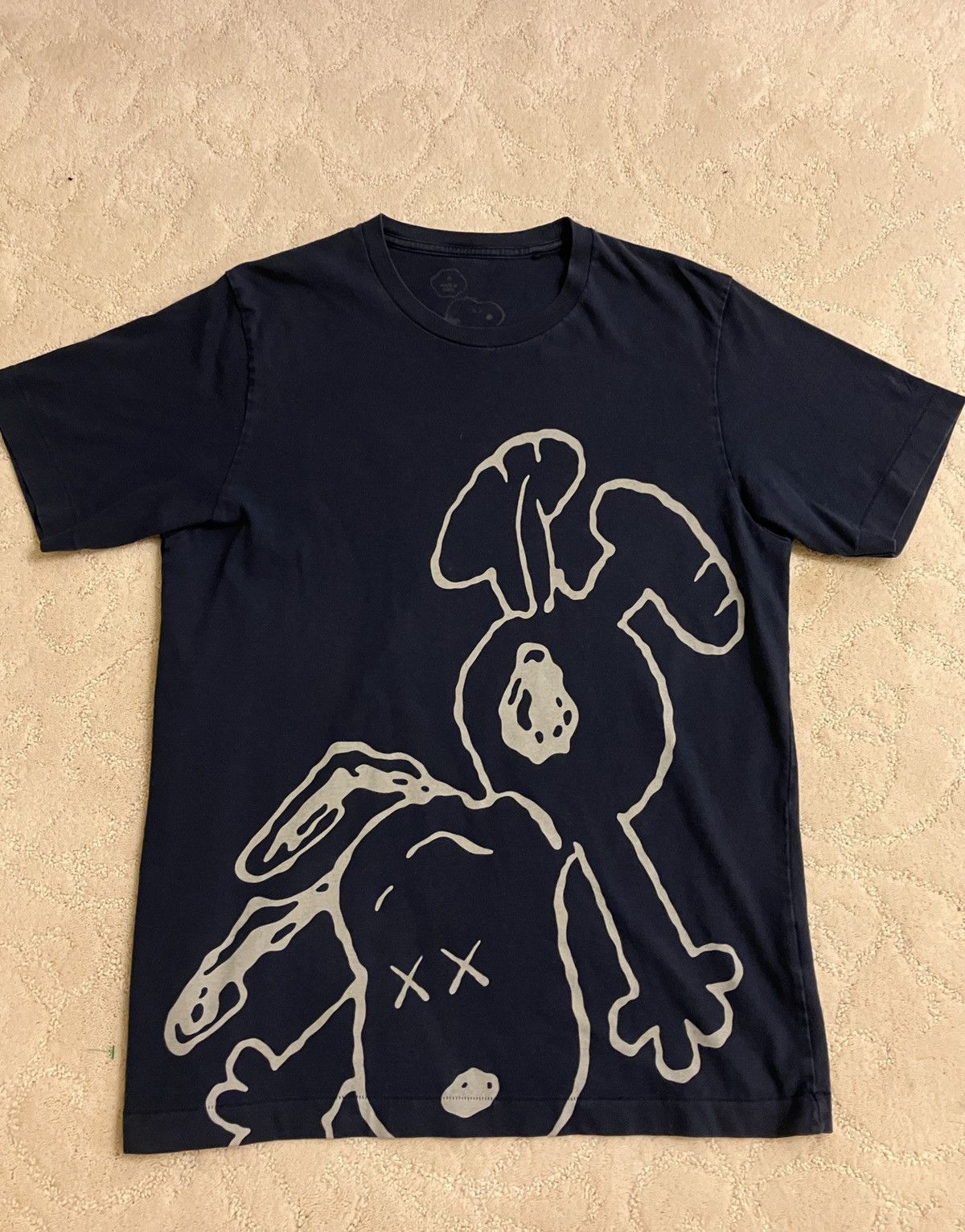 Kaws × Peanuts × Uniqlo KAWS x Snoopy x Uniqlo T Shirt | Grailed
