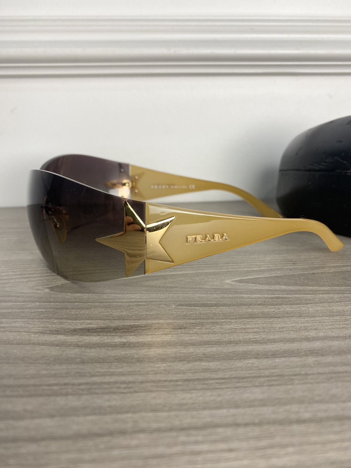 Vintage Prada Wrap Around Star Sunglasses | Grailed
