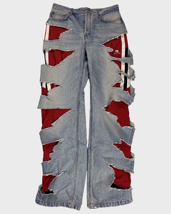 Balenciaga Slashed jeans in blue with red sporty b trackpants layering ...