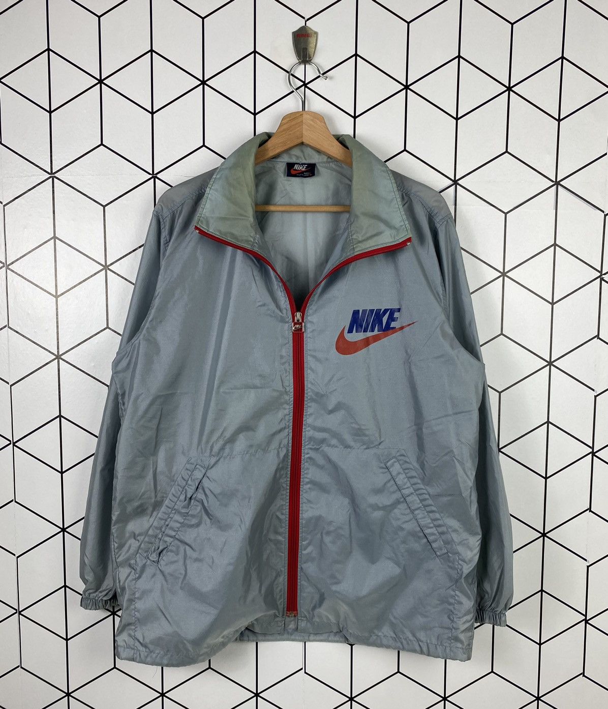 Nike VINTAGE 80S NIKE BLUE TAG SWOOSH WINDBREAKER | Grailed